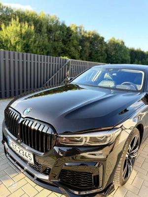 Black BMW 745 2020 in Klaipeda, with an engine capacity of 3.00 L and mileage of 93 thousand km for 42999 €, photo 15 on AUTOMOTO.COM.LV
