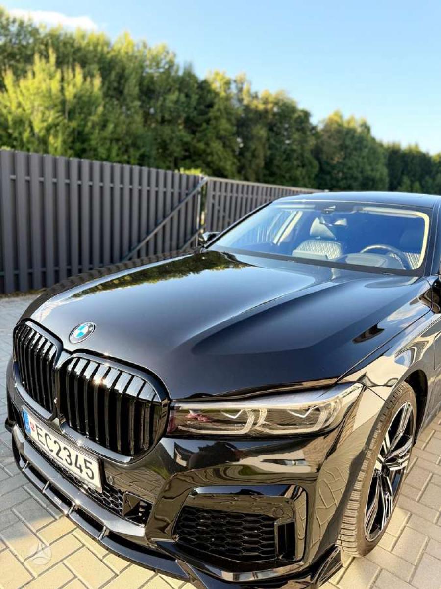 Black BMW 745 2020 in Klaipeda, with an engine capacity of 3.00 L and mileage of 93 thousand km for 42999 €, photo 15 on AUTOMOTO.COM.LV