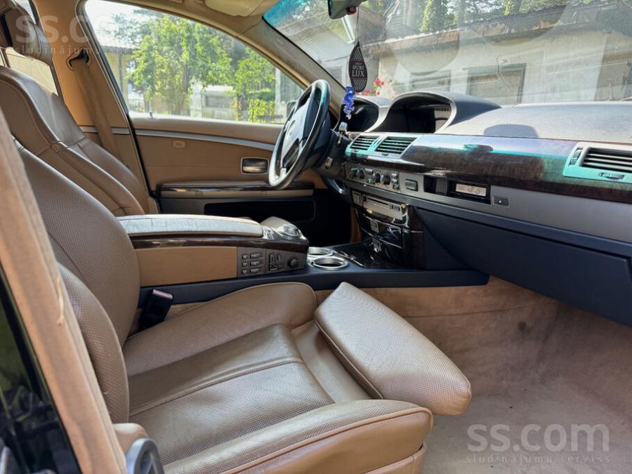 Black BMW 745 2002 in Riga, with an engine capacity of 4.50 L and mileage of 260 thousand km for 900 €, photo 14 on AUTOMOTO.COM.LV