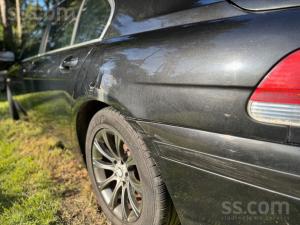 Black BMW 745 2002 in Riga, with an engine capacity of 4.50 L and mileage of 260 thousand km for 900 €, photo 20 on AUTOMOTO.COM.LV