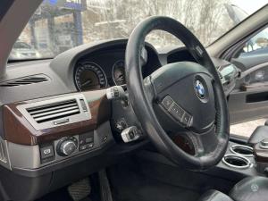 Black BMW 745 2006 in Vilnius, with an engine capacity of 4.42 L and mileage of 400 thousand km for 3650 €, photo 21 on AUTOMOTO.COM.LV