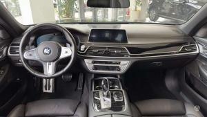 Black BMW 745 2019 in Marijampole, with an engine capacity of 3.00 L and mileage of 225 thousand km for 36999 €, photo 11 on AUTOMOTO.COM.LV