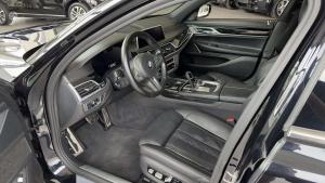 Black BMW 745 2019 in Marijampole, with an engine capacity of 3.00 L and mileage of 225 thousand km for 36999 €, photo 14 on AUTOMOTO.COM.LV