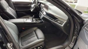 Black BMW 745 2019 in Marijampole, with an engine capacity of 3.00 L and mileage of 225 thousand km for 36999 €, photo 16 on AUTOMOTO.COM.LV
