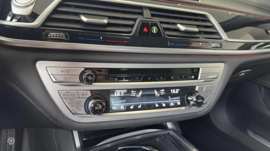 Black BMW 745 2019 in Marijampole, with an engine capacity of 3.00 L and mileage of 225 thousand km for 36999 €, photo 22 on AUTOMOTO.COM.LV