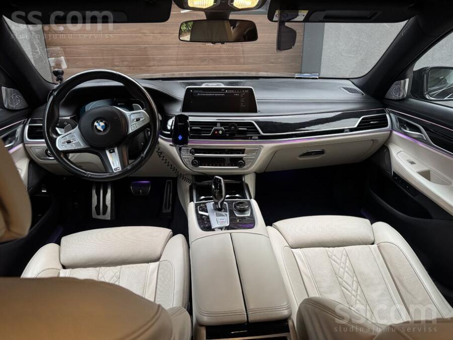 Black BMW 745 2019 in Riga, with an engine capacity of 3.00 L and mileage of 0 thousand km for 40000 €, photo 4 on AUTOMOTO.COM.LV