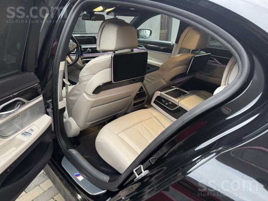 Black BMW 745 2019 in Riga, with an engine capacity of 3.00 L and mileage of 0 thousand km for 40000 €, photo 7 on AUTOMOTO.COM.LV