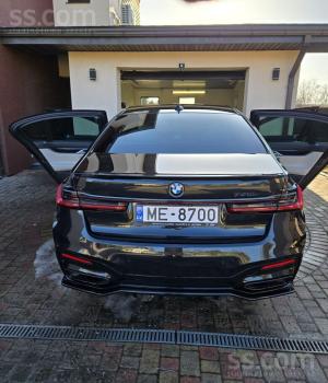Black BMW 745 2020 in Riga, with an engine capacity of 3.00 L and mileage of 60 thousand km for 39000 €, photo 4 on AUTOMOTO.COM.LV