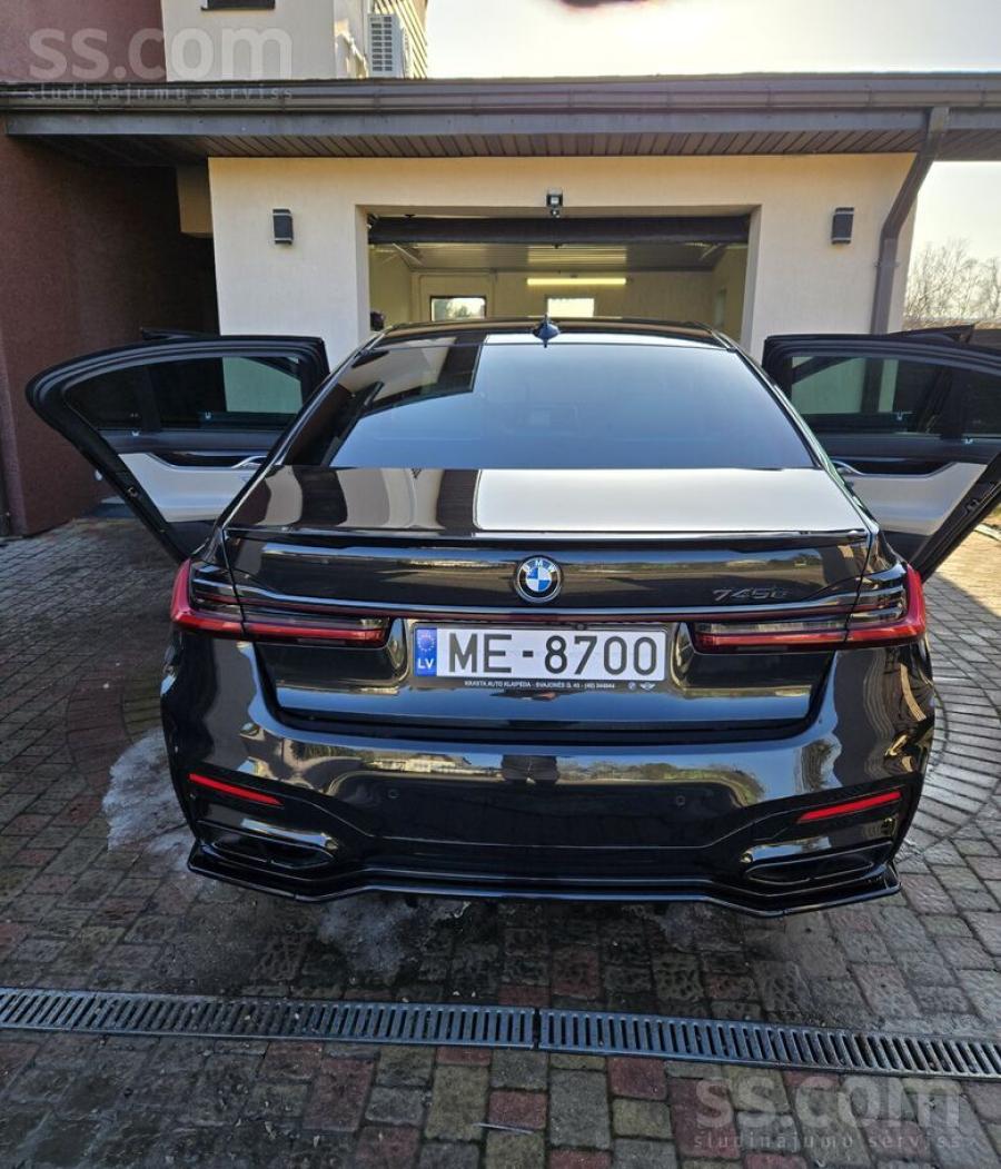 Black BMW 745 2020 in Riga, with an engine capacity of 3.00 L and mileage of 60 thousand km for 39000 €, photo 4 on AUTOMOTO.COM.LV