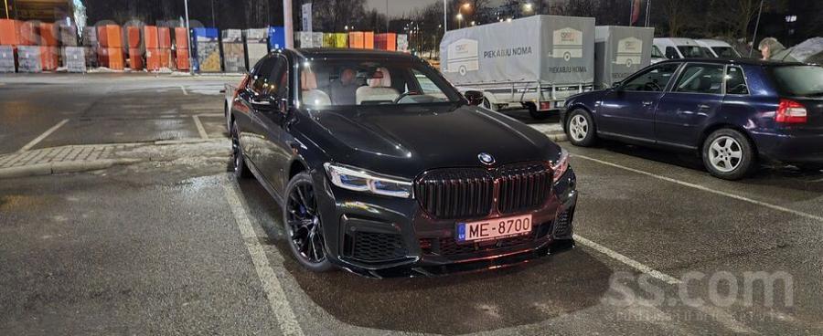 Black BMW 745 2020 in Riga, with an engine capacity of 3.00 L and mileage of 60 thousand km for 39000 €, photo 6 on AUTOMOTO.COM.LV
