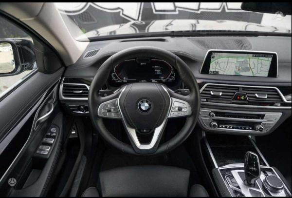 Black BMW 745 2022 in Vilnius, with an engine capacity of 3.00 L and mileage of 73 thousand km for 53900 €, photo 8 on AUTOMOTO.COM.LV