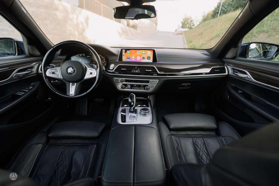 Blue BMW 745 2020 in Vilnius, with an engine capacity of 3.00 L and mileage of 118 thousand km for 45000 €, photo 12 on AUTOMOTO.COM.LV