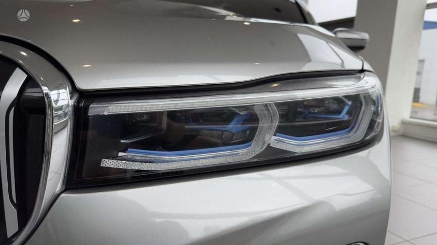 Grey BMW 745 2019 in Marijampole, with an engine capacity of 3.00 L and mileage of 146 thousand km for 41999 €, photo 4 on AUTOMOTO.COM.LV