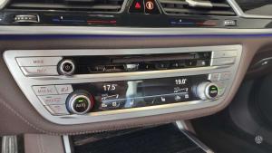Grey BMW 745 2019 in Marijampole, with an engine capacity of 3.00 L and mileage of 146 thousand km for 41999 €, photo 24 on AUTOMOTO.COM.LV
