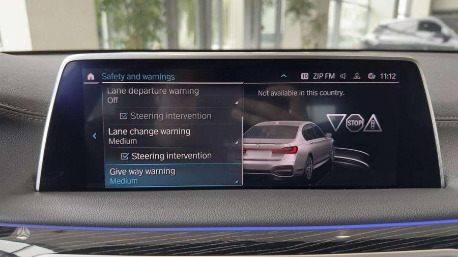 Grey BMW 745 2019 in Marijampole, with an engine capacity of 3.00 L and mileage of 146 thousand km for 41999 €, photo 35 on AUTOMOTO.COM.LV