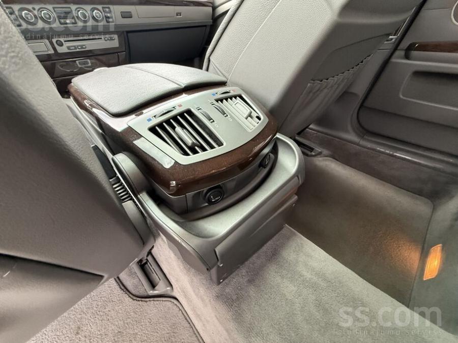 Black BMW 750 2007 in Talsi, with an engine capacity of 5.00 L and mileage of 164 thousand km for 6497 €, photo 11 on AUTOMOTO.COM.LV