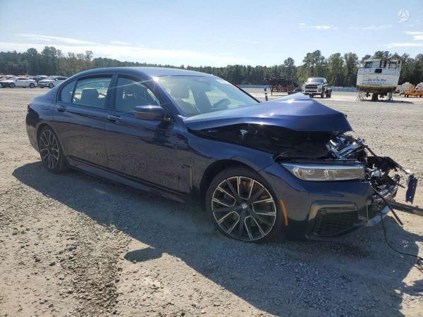 Black BMW 750 2022 in Kaunas, with an engine capacity of 4.40 L and mileage of 70 thousand km for 23500 €, photo 1 on AUTOMOTO.COM.LV