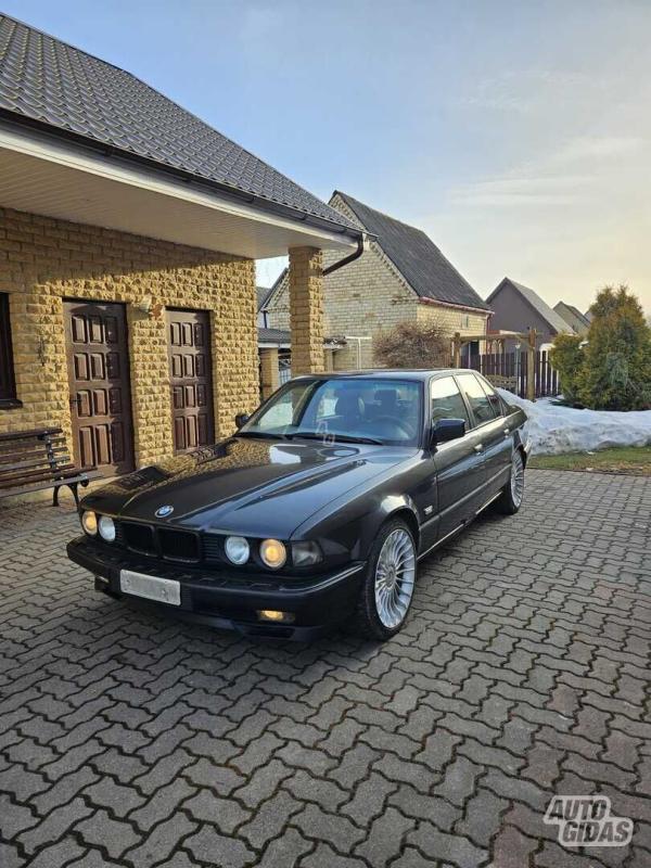 Black BMW 750 1991 in Vilnius, with an engine capacity of 5.00 L and mileage of 320 thousand km for 6100 €, photo 1 on AUTOMOTO.COM.LV