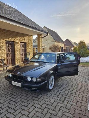 Melns BMW 750 1991 Viļņa, ar dzinēja tilpumu 5.00 L un nobraukumu 320 tūkst. km par 6100 €, foto 7 vietnē AUTOMOTO.COM.LV