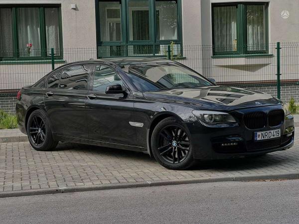 Black BMW 750 2010 in Vilnius, with an engine capacity of 4.40 L and mileage of 246 thousand km for 6300 €, photo 3 on AUTOMOTO.COM.LV