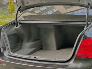 Black BMW 750 2010 in Vilnius, with an engine capacity of 4.40 L and mileage of 246 thousand km for 6300 €, photo 13 on AUTOMOTO.COM.LV