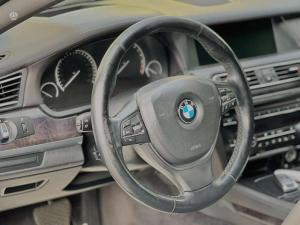 Black BMW 750 2010 in Vilnius, with an engine capacity of 4.40 L and mileage of 246 thousand km for 6300 €, photo 19 on AUTOMOTO.COM.LV