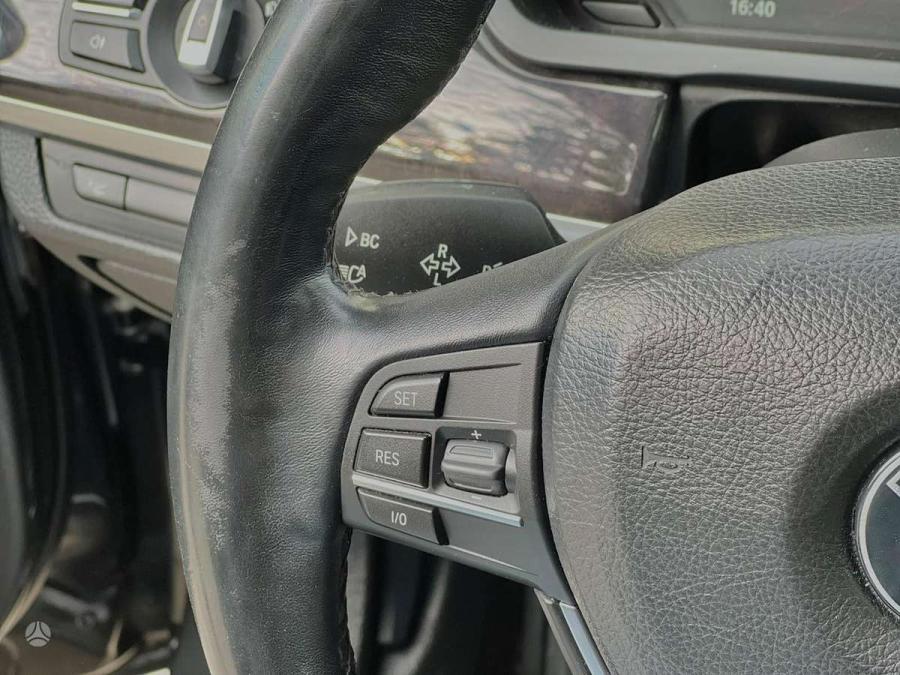 Black BMW 750 2010 in Vilnius, with an engine capacity of 4.40 L and mileage of 246 thousand km for 6300 €, photo 23 on AUTOMOTO.COM.LV