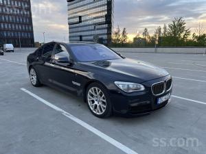 Black BMW 750 2012 in Riga, with an engine capacity of 3.00 L and mileage of 225 thousand km for 14500 €, photo  on AUTOMOTO.COM.LV