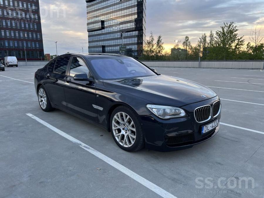 Black BMW 750 2012 in Riga, with an engine capacity of 3.00 L and mileage of 225 thousand km for 14500 €, photo 1 on AUTOMOTO.COM.LV