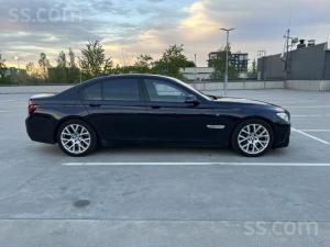 Black BMW 750 2012 in Riga, with an engine capacity of 3.00 L and mileage of 225 thousand km for 14500 €, photo 6 on AUTOMOTO.COM.LV