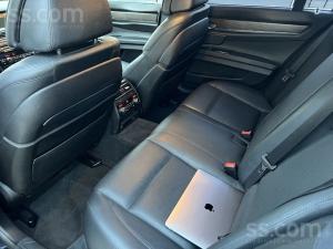 Black BMW 750 2012 in Riga, with an engine capacity of 3.00 L and mileage of 225 thousand km for 14500 €, photo 11 on AUTOMOTO.COM.LV