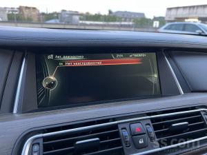 Black BMW 750 2012 in Riga, with an engine capacity of 3.00 L and mileage of 225 thousand km for 14500 €, photo 14 on AUTOMOTO.COM.LV