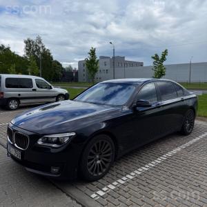 Black BMW 750 2013 in Riga, with an engine capacity of 3.00 L and mileage of 292 thousand km for 9990 €, photo  on AUTOMOTO.COM.LV