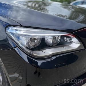 Black BMW 750 2013 in Riga, with an engine capacity of 3.00 L and mileage of 292 thousand km for 9990 €, photo 5 on AUTOMOTO.COM.LV