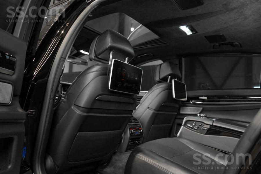 Melns BMW 750 2013 Rīga, ar dzinēja tilpumu 4.40 L un nobraukumu 210 tūkst. km par 33000 €, foto 14 vietnē AUTOMOTO.COM.LV