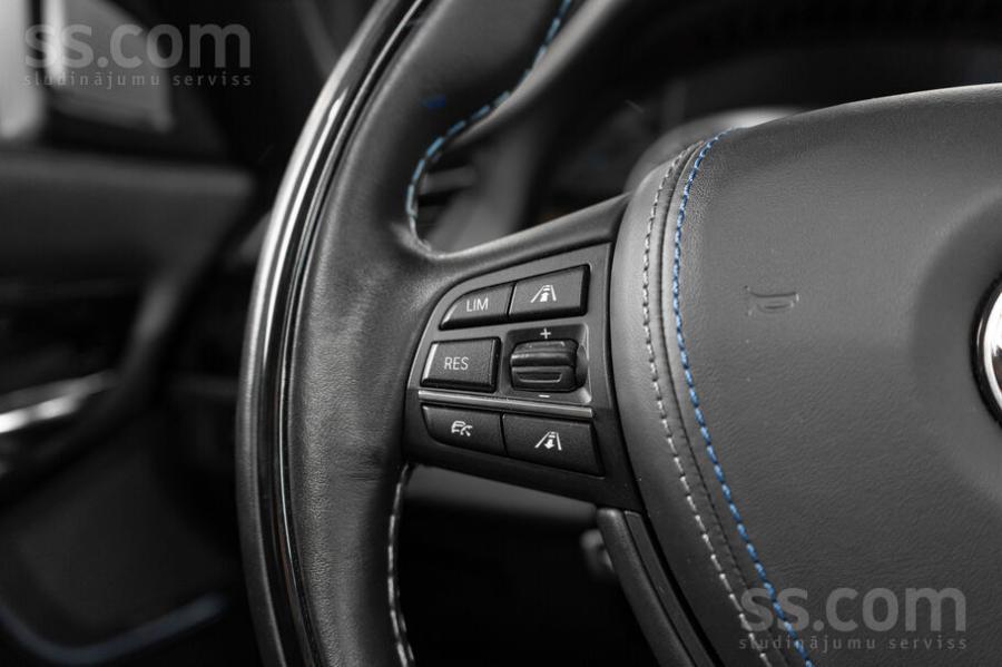 Melns BMW 750 2013 Rīga, ar dzinēja tilpumu 4.40 L un nobraukumu 210 tūkst. km par 33000 €, foto 22 vietnē AUTOMOTO.COM.LV