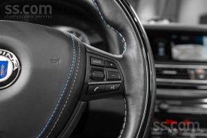 Melns BMW 750 2013 Rīga, ar dzinēja tilpumu 4.40 L un nobraukumu 210 tūkst. km par 33000 €, foto 23 vietnē AUTOMOTO.COM.LV