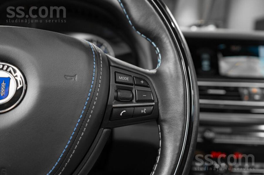 Melns BMW 750 2013 Rīga, ar dzinēja tilpumu 4.40 L un nobraukumu 210 tūkst. km par 33000 €, foto 23 vietnē AUTOMOTO.COM.LV