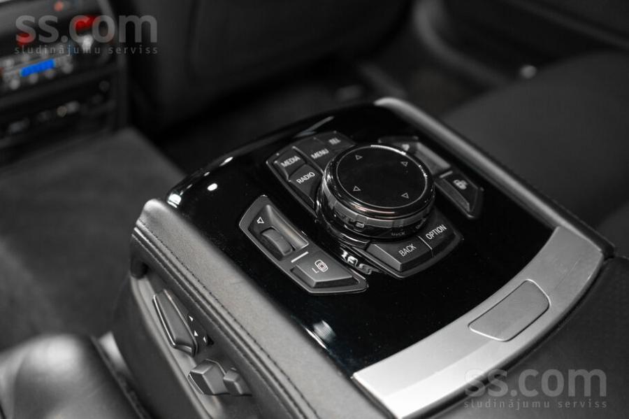 Melns BMW 750 2013 Rīga, ar dzinēja tilpumu 4.40 L un nobraukumu 210 tūkst. km par 33000 €, foto 30 vietnē AUTOMOTO.COM.LV