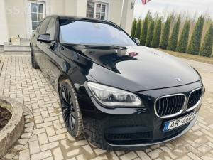 Black BMW 750 2014 in Riga, with an engine capacity of 3.00 L and mileage of 291 thousand km for 13900 €, photo  on AUTOMOTO.COM.LV