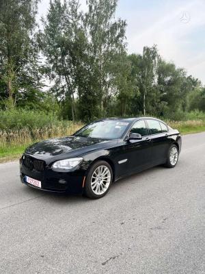 Black BMW 750 2014 in Kaunas, with an engine capacity of 4.40 L and mileage of 247 thousand km for 7100 €, photo  on AUTOMOTO.COM.LV
