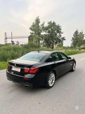 Black BMW 750 2014 in Kaunas, with an engine capacity of 4.40 L and mileage of 247 thousand km for 7100 €, photo 6 on AUTOMOTO.COM.LV