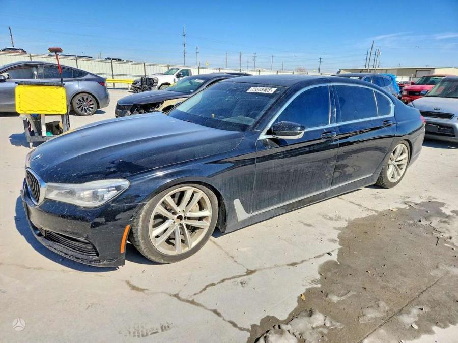 Black BMW 750 2016 in Vilnius, with an engine capacity of 4.40 L and mileage of 246 thousand km for 9999 €, photo 1 on AUTOMOTO.COM.LV