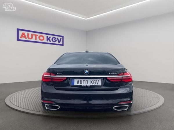 Black BMW 750 2016 in Vilnius, with an engine capacity of 3.00 L and mileage of 302 thousand km for 17999 €, photo 4 on AUTOMOTO.COM.LV