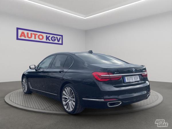 Black BMW 750 2016 in Vilnius, with an engine capacity of 3.00 L and mileage of 302 thousand km for 17999 €, photo 3 on AUTOMOTO.COM.LV