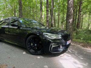 Black BMW 750 2016 in Vilnius, with an engine capacity of 4.40 L and mileage of 127 thousand km for 20500 €, photo 3 on AUTOMOTO.COM.LV