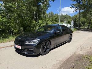 Black BMW 750 2016 in Vilnius, with an engine capacity of 4.40 L and mileage of 127 thousand km for 20500 €, photo 8 on AUTOMOTO.COM.LV