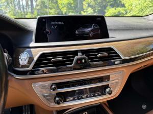 Black BMW 750 2016 in Vilnius, with an engine capacity of 4.40 L and mileage of 127 thousand km for 20500 €, photo 39 on AUTOMOTO.COM.LV