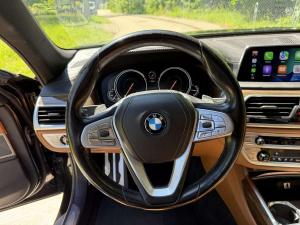 Black BMW 750 2016 in Vilnius, with an engine capacity of 4.40 L and mileage of 127 thousand km for 20500 €, photo 42 on AUTOMOTO.COM.LV