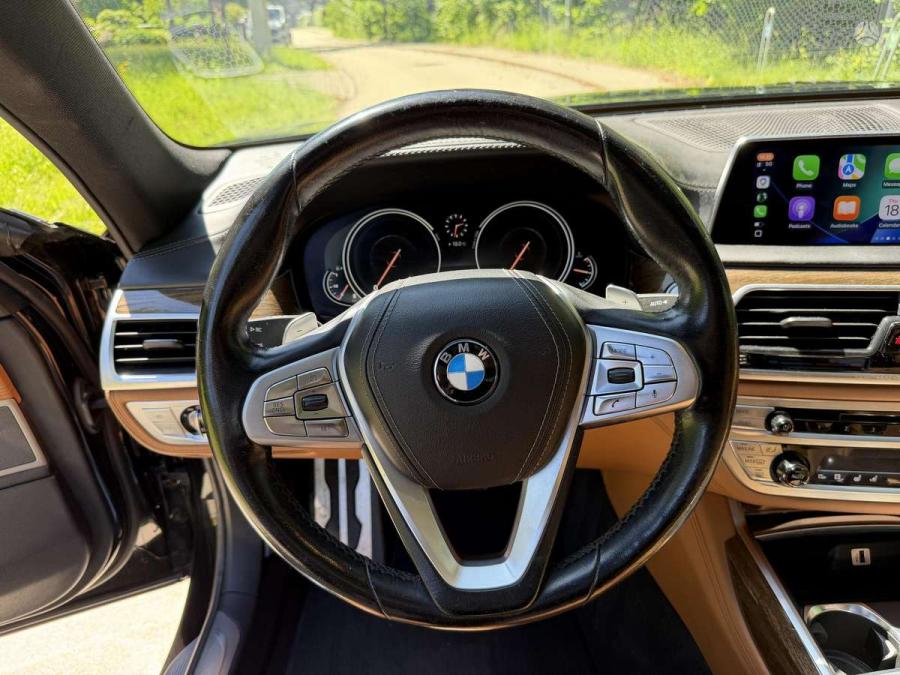 Black BMW 750 2016 in Vilnius, with an engine capacity of 4.40 L and mileage of 127 thousand km for 20500 €, photo 42 on AUTOMOTO.COM.LV